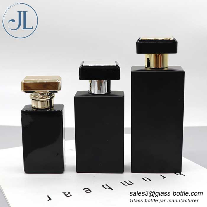 Elegant black matte perfume bottles with distinct caps wholesale